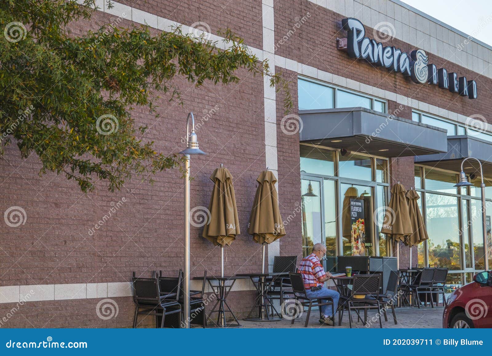 Man Eating Outside at Panera Bread Editorial Photo - Image of customer ...