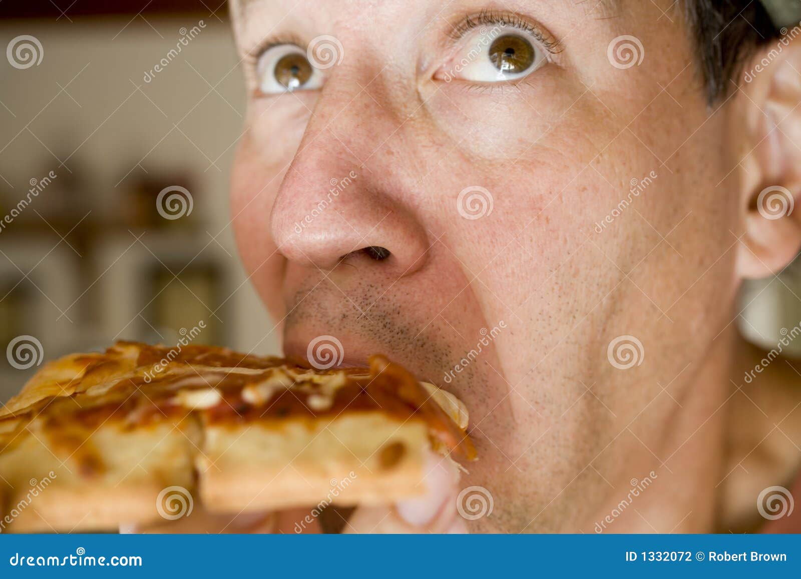Man Eating Pepperoni Pizza stock photo. Image of pepperoni - 1332072