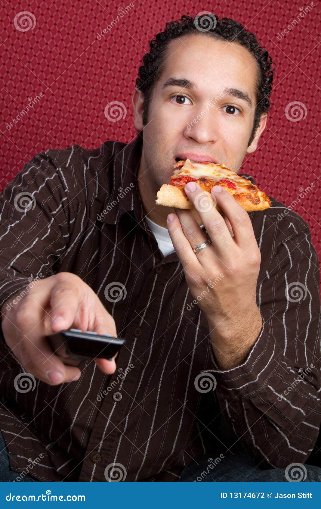 Man Eating Pizza stock photo. Image of african, controller - 13174672