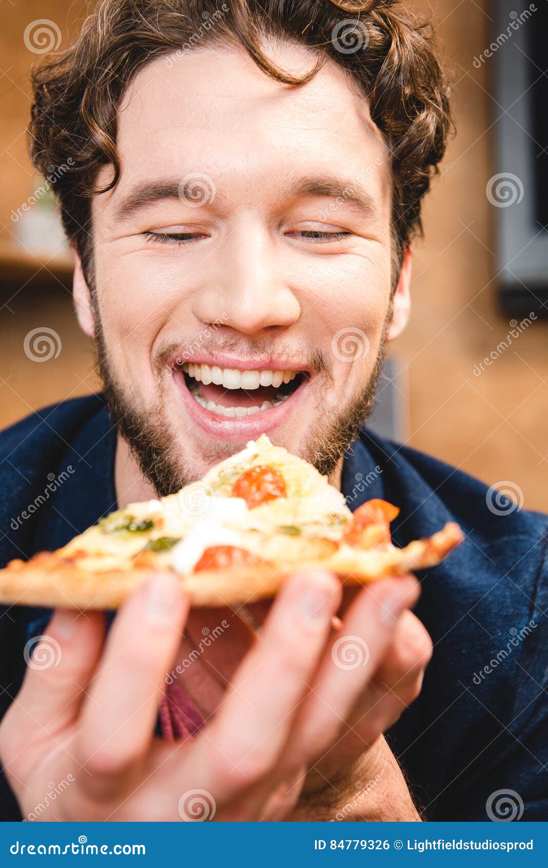 Man eating pizza stock photo. Image of color, happy, vertical - 84779326
