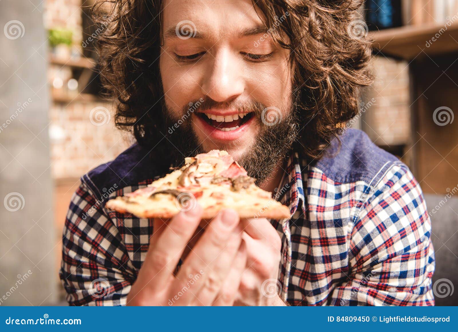 Man eating pizza stock photo. Image of male, young, tasty - 84809450