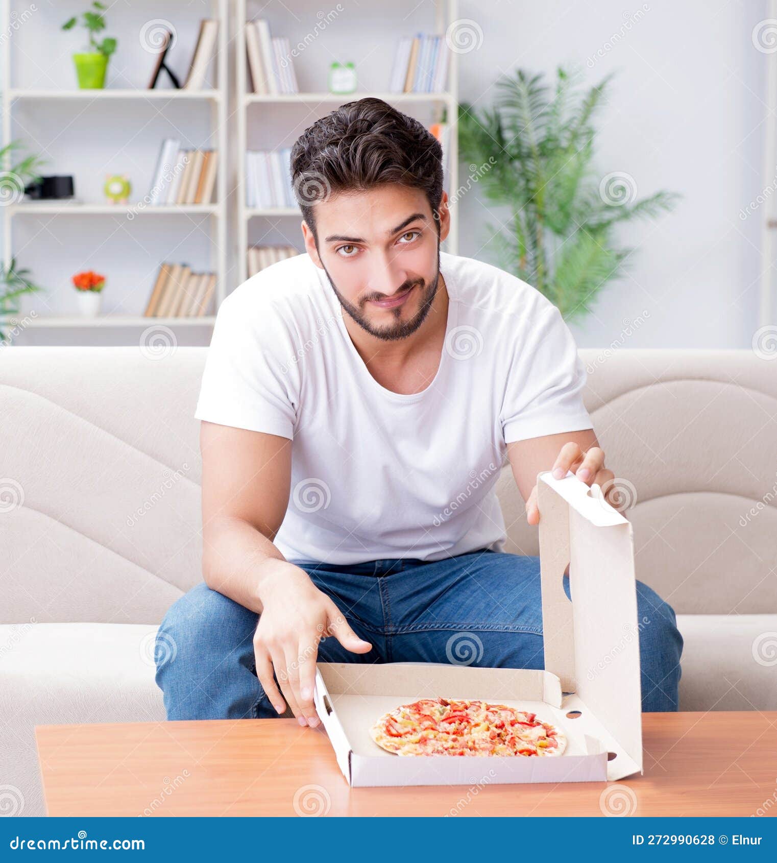 Man Eating Pizza Having a Takeaway at Home Relaxing Resting Stock Photo ...