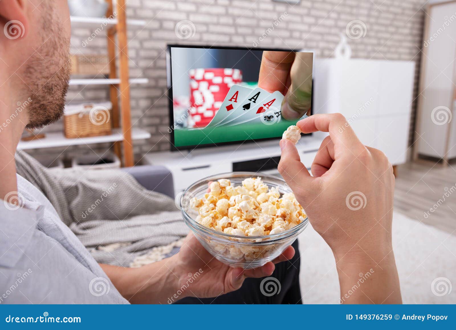 Man Eating Popcorn while Watching Television Stock Image - Image of ...