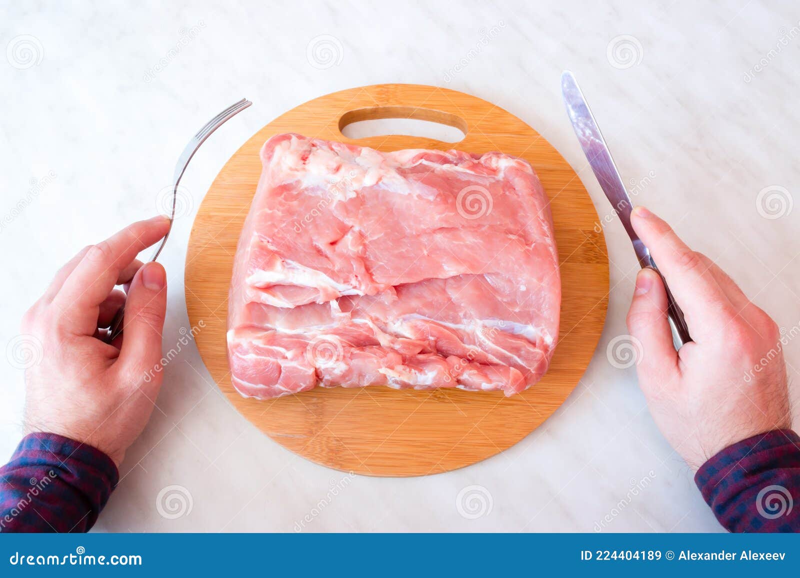 Man eating raw meat stock image. Image of background - 224404189