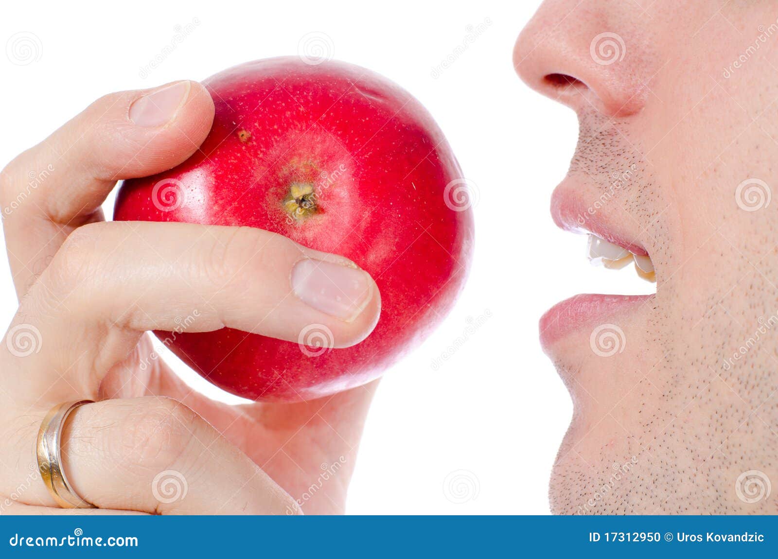 Man eating a red apple stock photo. Image of mouth, health - 17312950