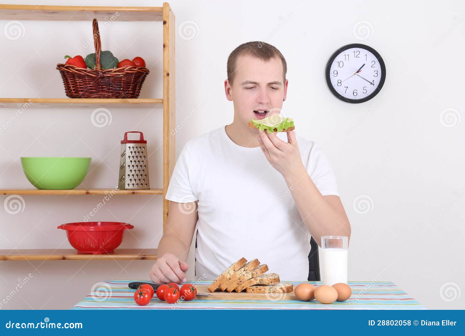 Man Eating Sandwich with Cheese in the Kitchen Stock Photo - Image of ...