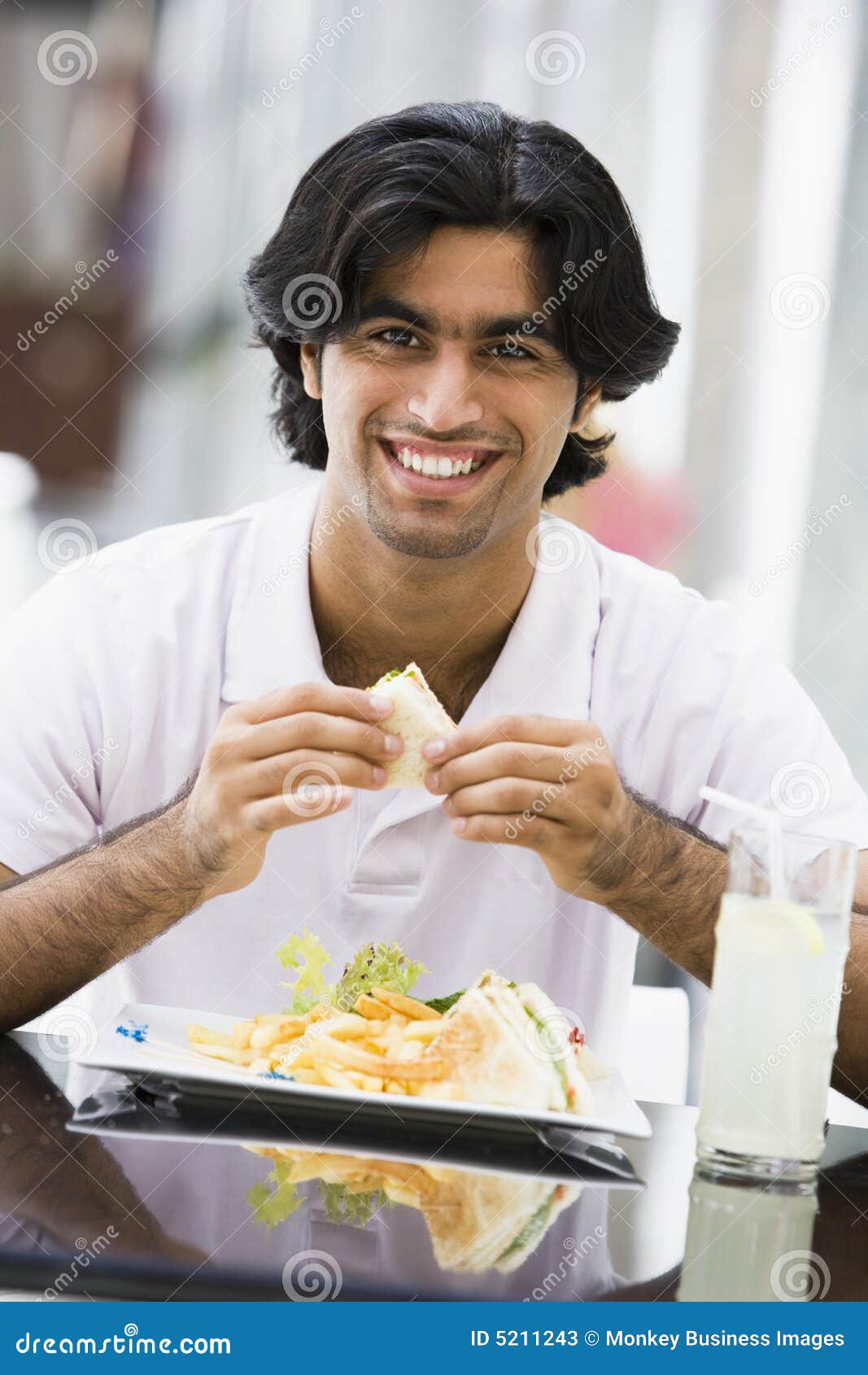 Man Eating Sandwiches at Cafe Stock Image - Image of middle, enjoying ...
