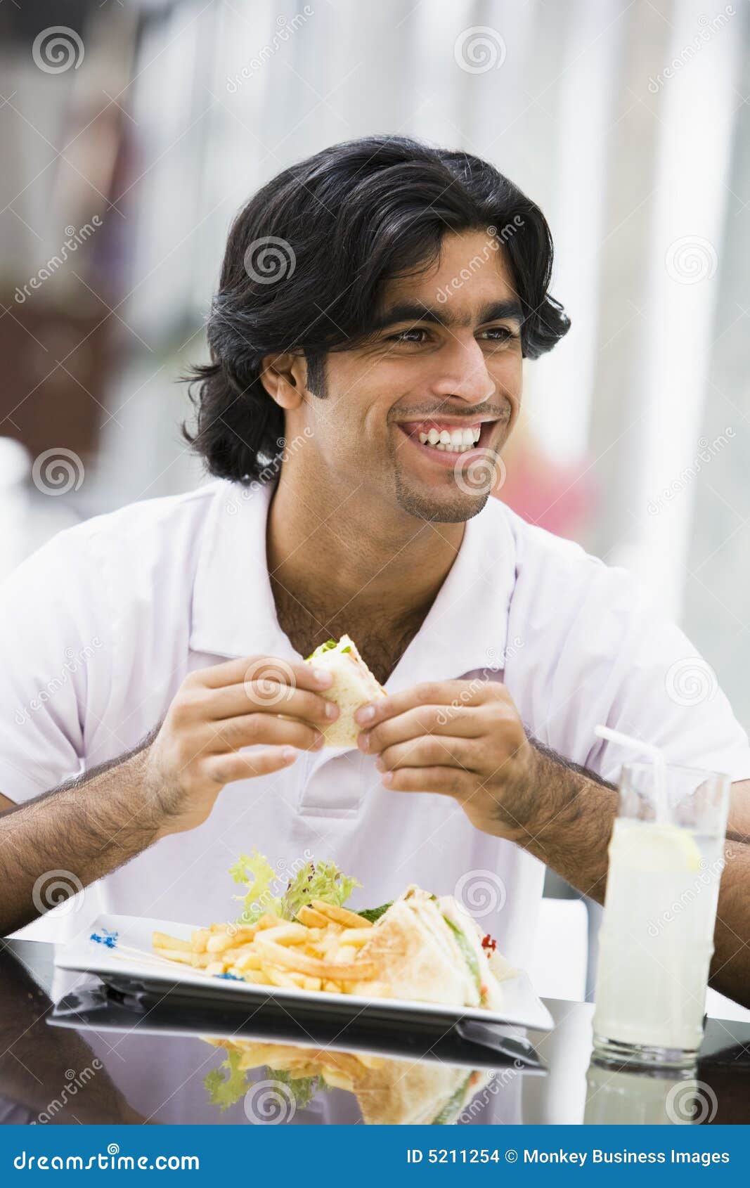 Man Eating Sandwiches at Cafe Stock Photo - Image of young, chips: 5211254