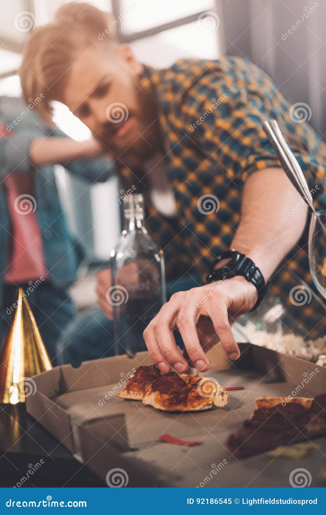 Man Eating Stale Pizza in Messy Room Stock Image - Image of youth, food ...