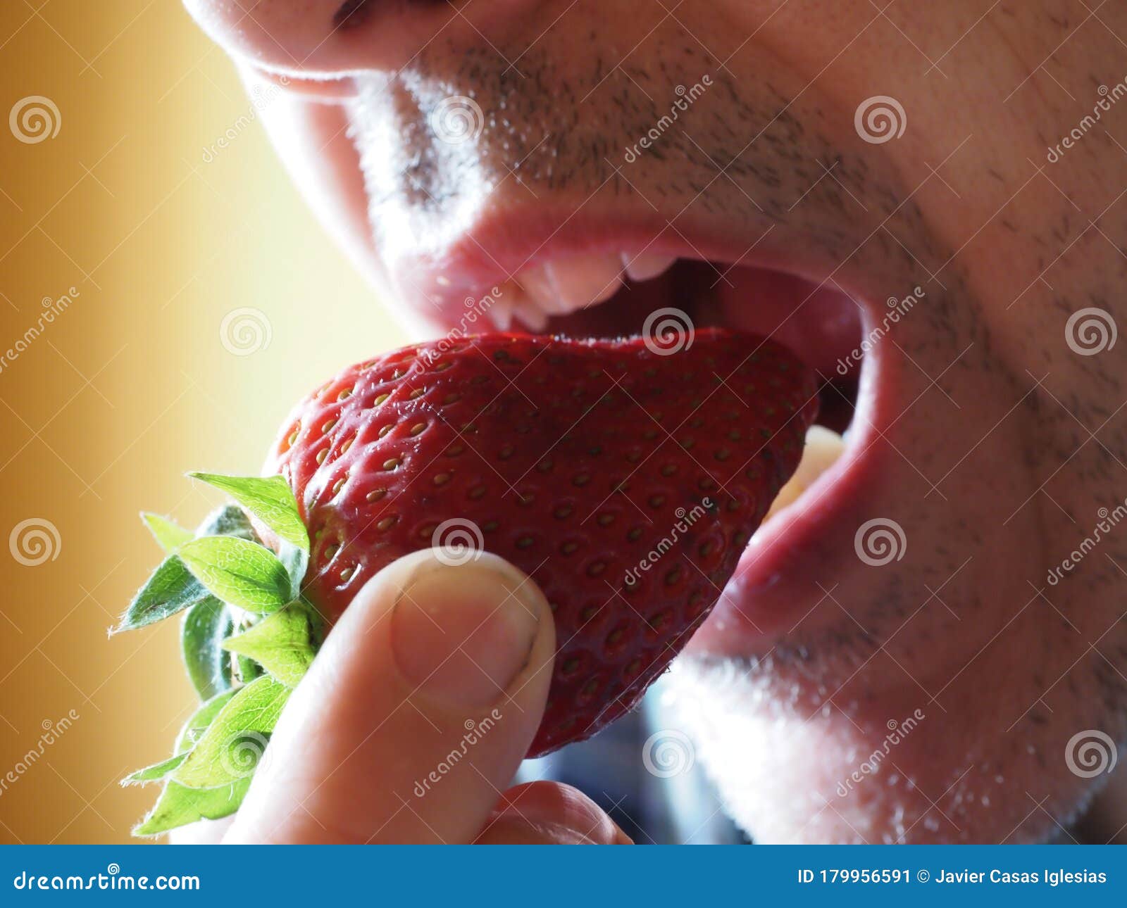 Man Eating a Strawberry Red Stock Image - Image of cocktail, strawberry ...