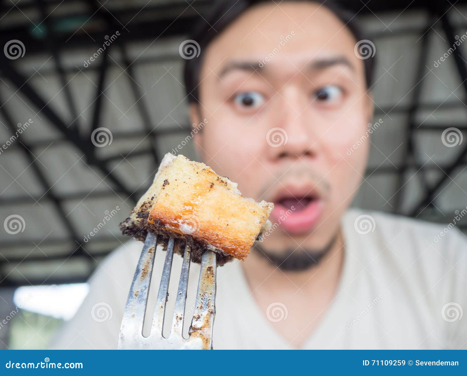 Man eating toast. stock image. Image of face, asia, cookies - 71109259