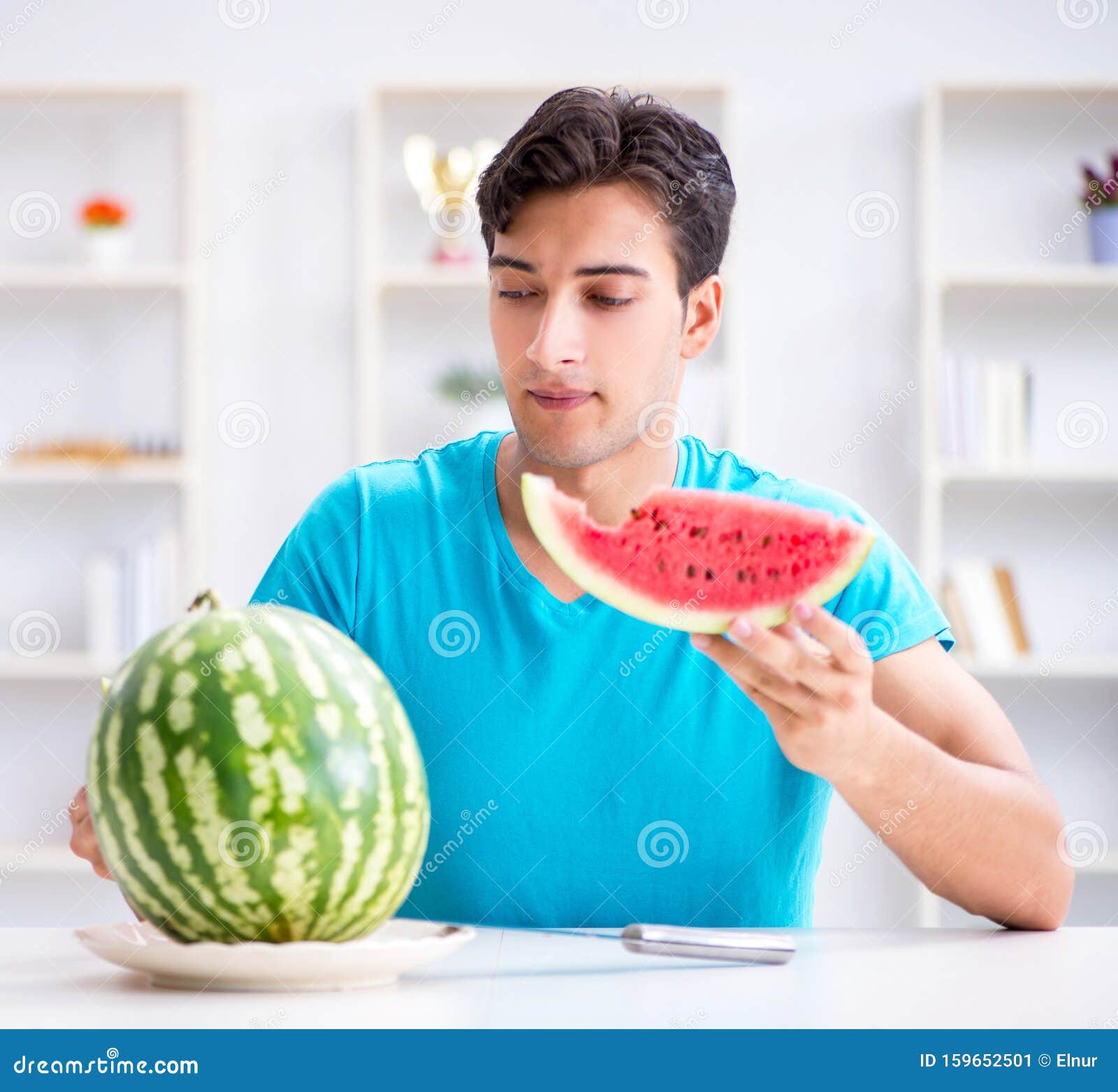 Man Eating Watermelon at Home Stock Image - Image of hungry, home ...