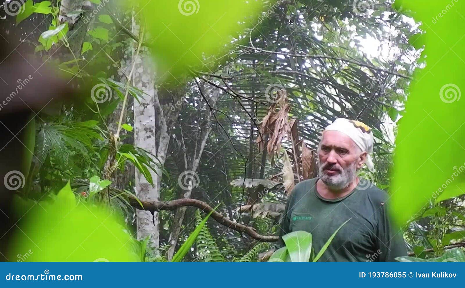 A Man is Eating in the Woods. Stock Video - Video of legs, tree: 193786055