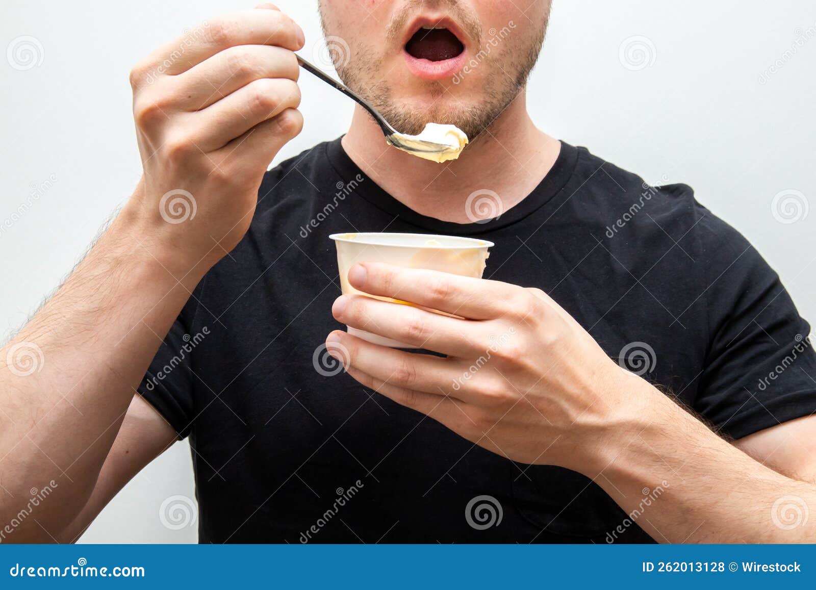Man is Eating Yogurt; Healthy Lifestyle Concept Stock Photo - Image of ...