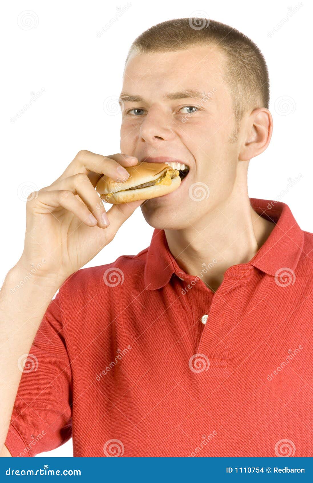 Man eats burger stock photo. Image of delectable, hamburger - 1110754