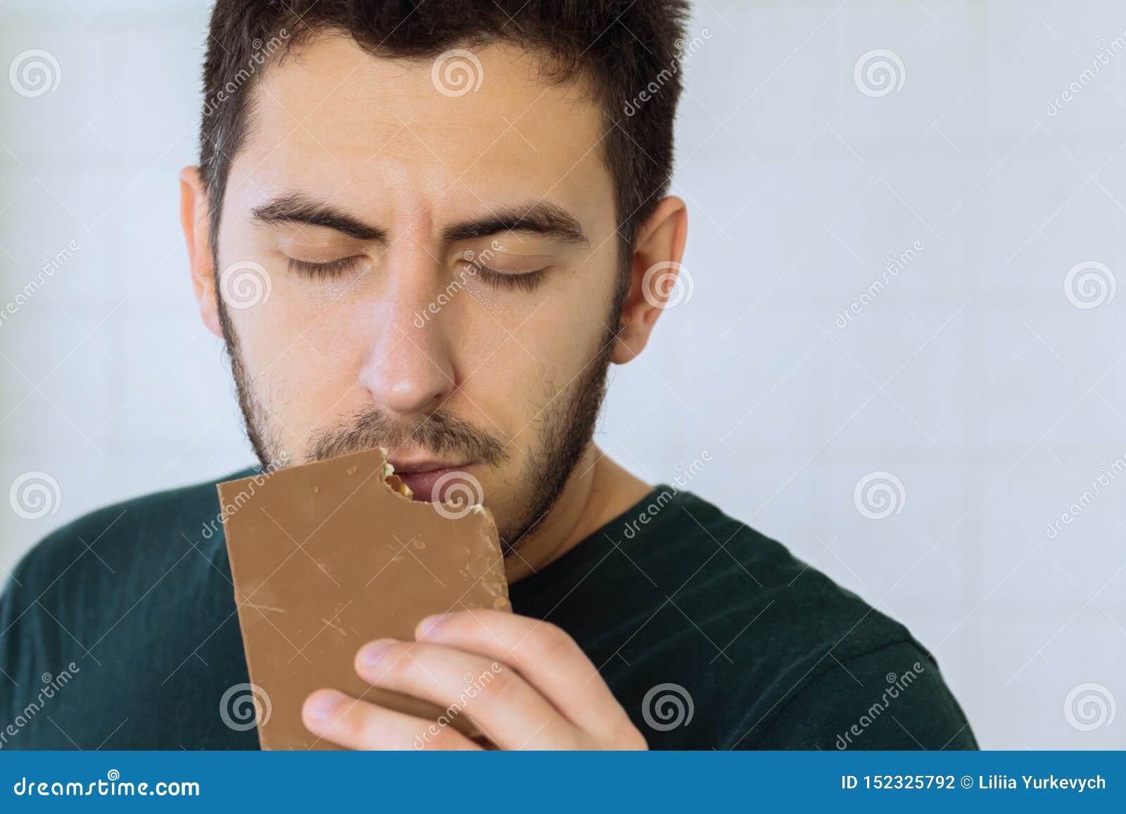 Man Eats Chocolate with Great Pleasure Stock Photo - Image of face ...