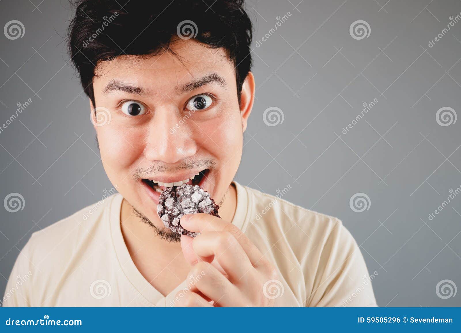 Man eats cookies. stock photo. Image of enjoying, food - 59505296