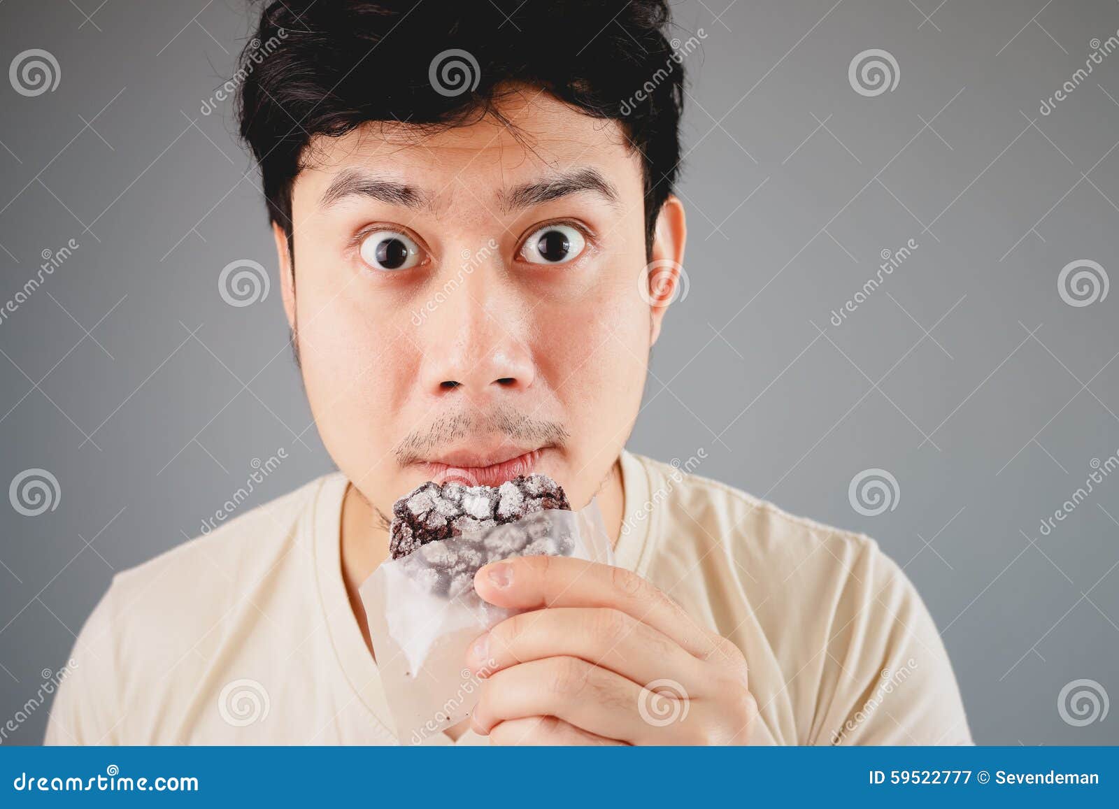 Man eats cookies. stock image. Image of close, lifestyle - 59522777