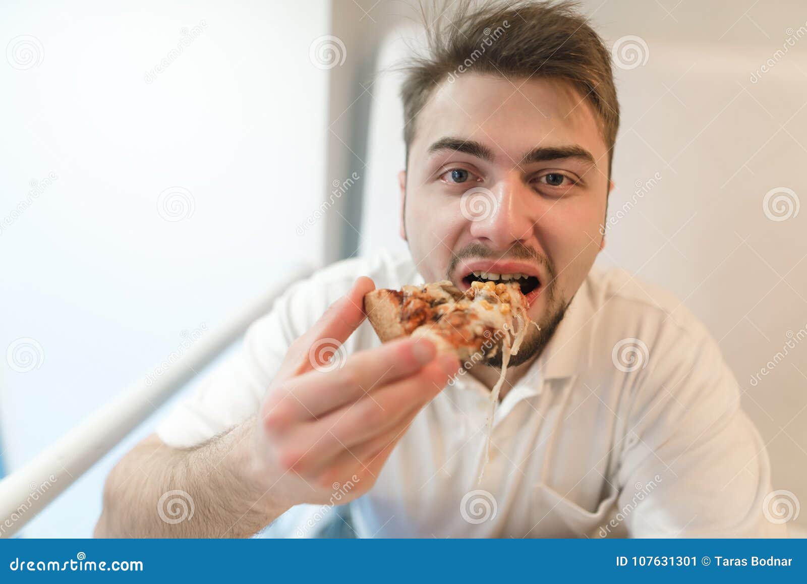 The Man Eats a Delicious Pizza. Fast Food for Lunch. Stock Image ...