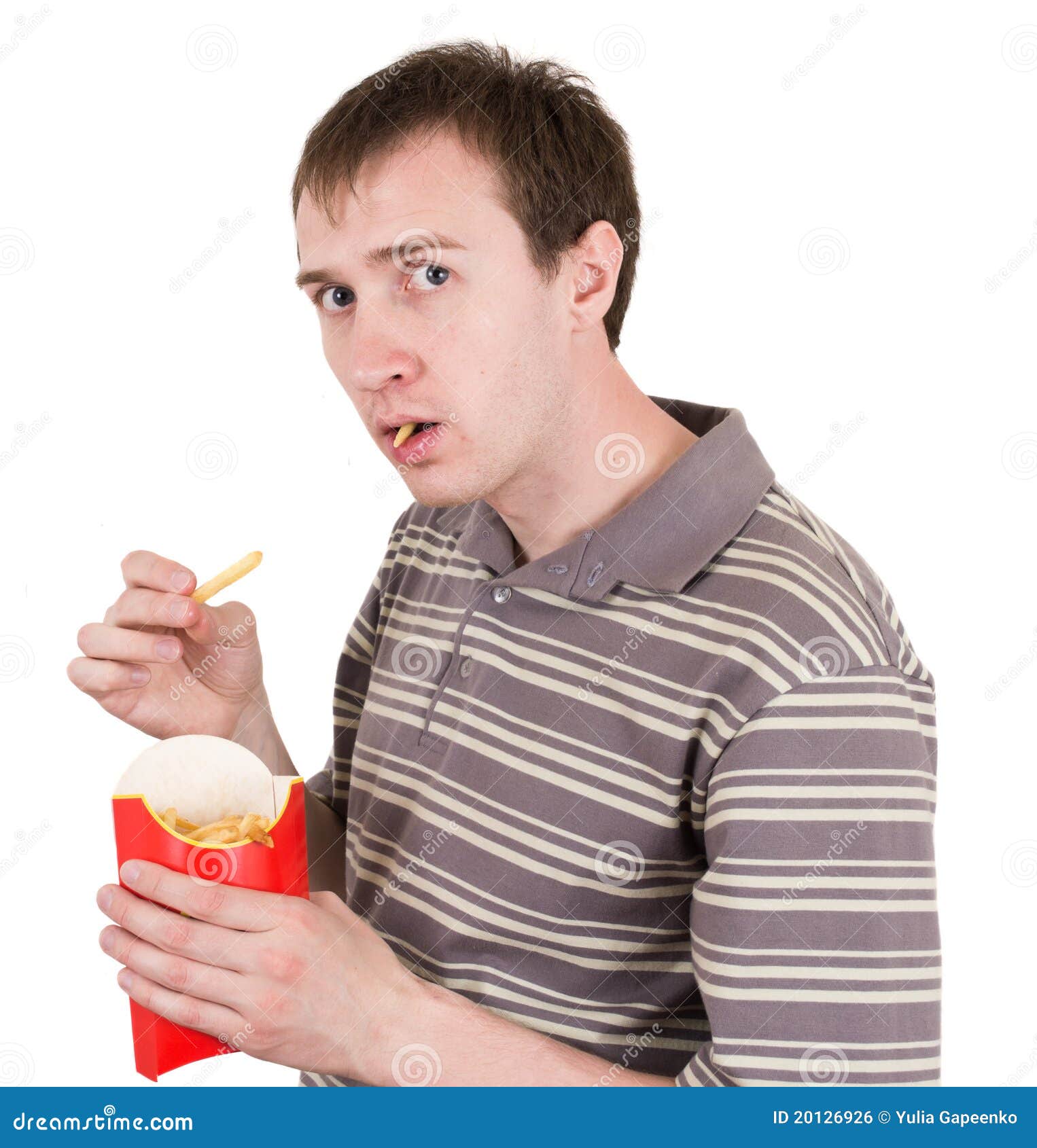 Man eats French fries stock photo. Image of person, menu - 20126926