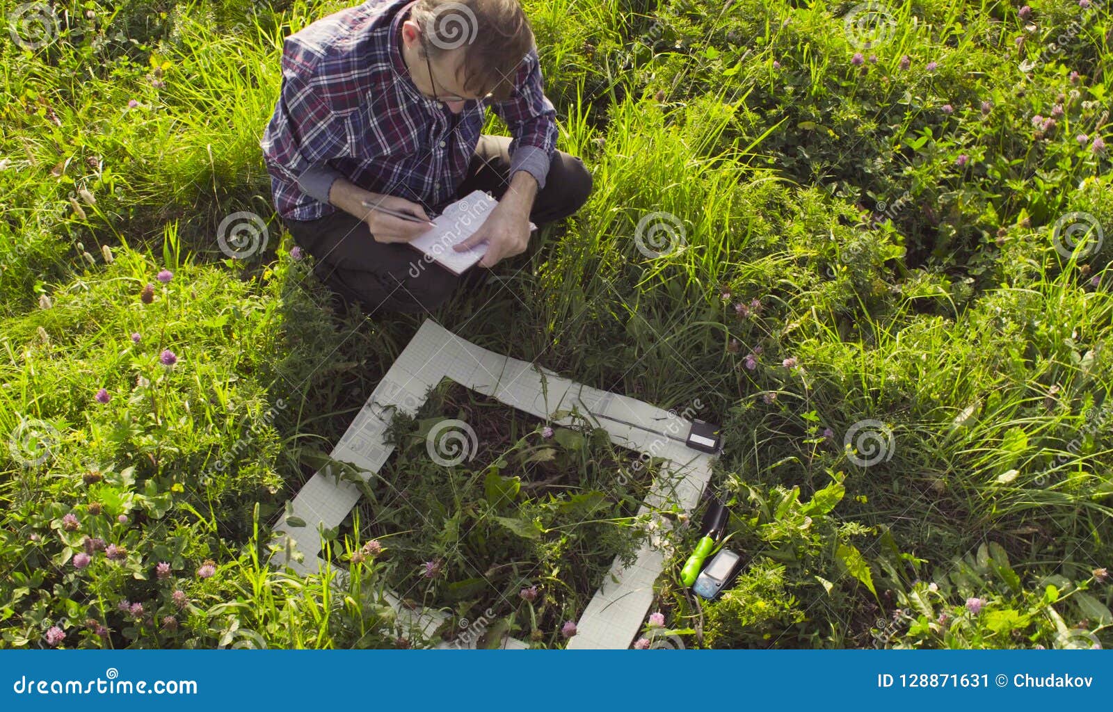 The Man Ecologist Making Notes in the Diary Stock Image - Image of ...