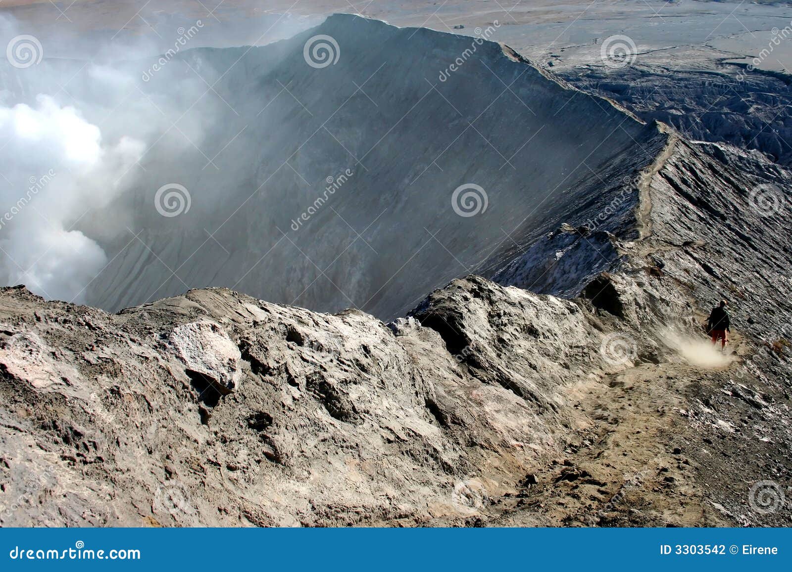 Man on the edge of volcano stock photo. Image of lonely - 3303542