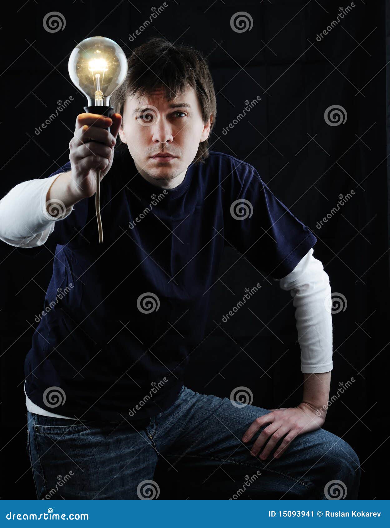 Man with electric bulb. stock image. Image of handsome - 15093941