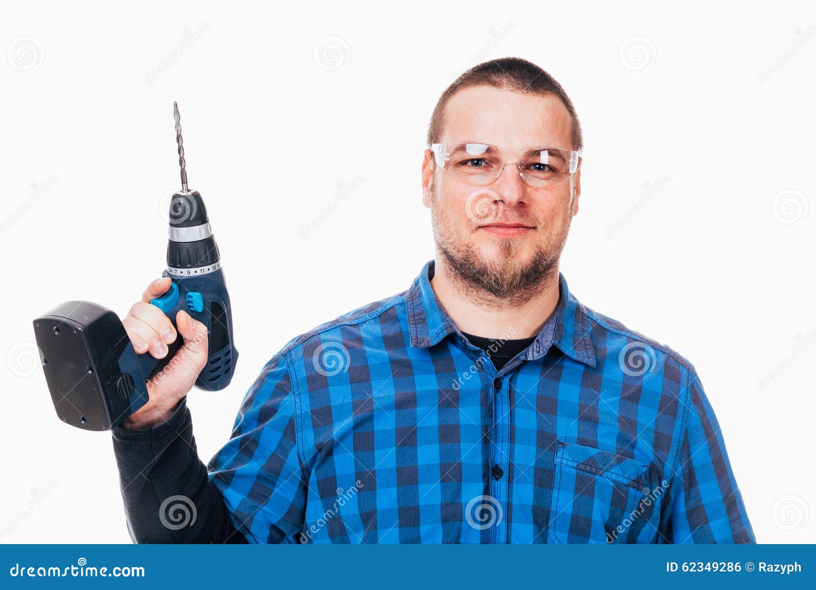 Man with electric drill stock photo. Image of drilling - 62349286