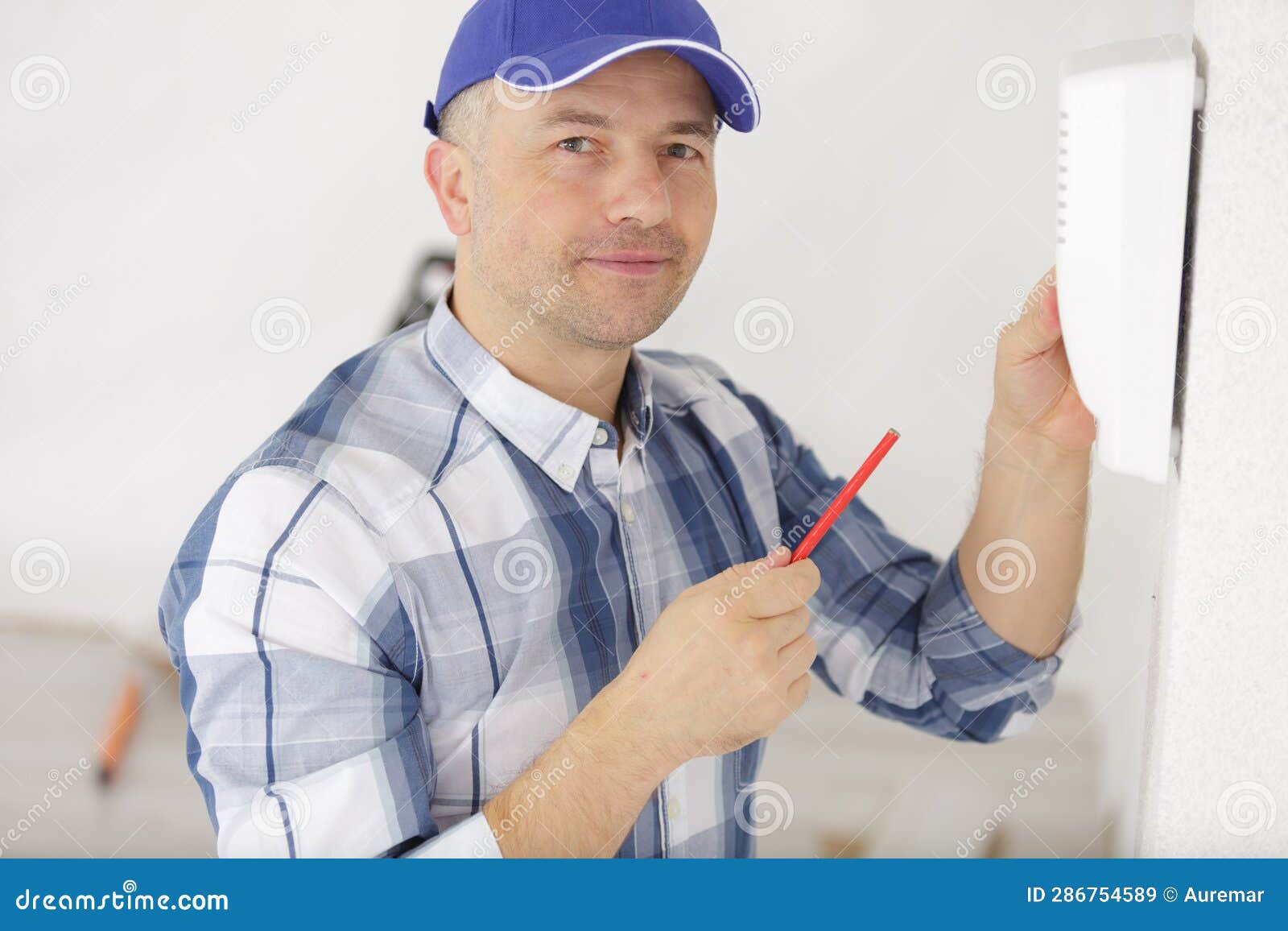 Man Electrician Installing Intercom on Wall Stock Image - Image of ... Man Electrician Installing Intercom on Wall Stock Image - Image of ...