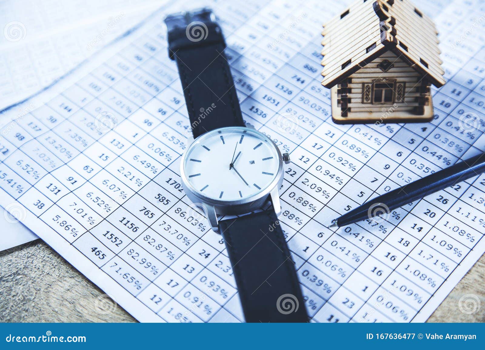 Man elegant watch on graph stock image. Image of desktop - 167636477