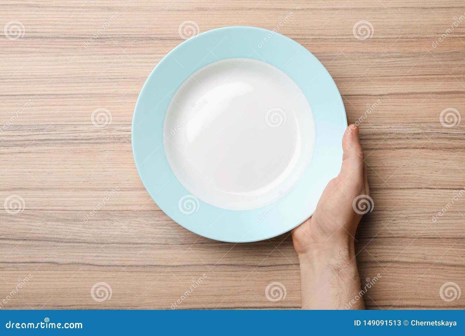 Man with Empty Plate at Wooden Table Stock Image - Image of color ...