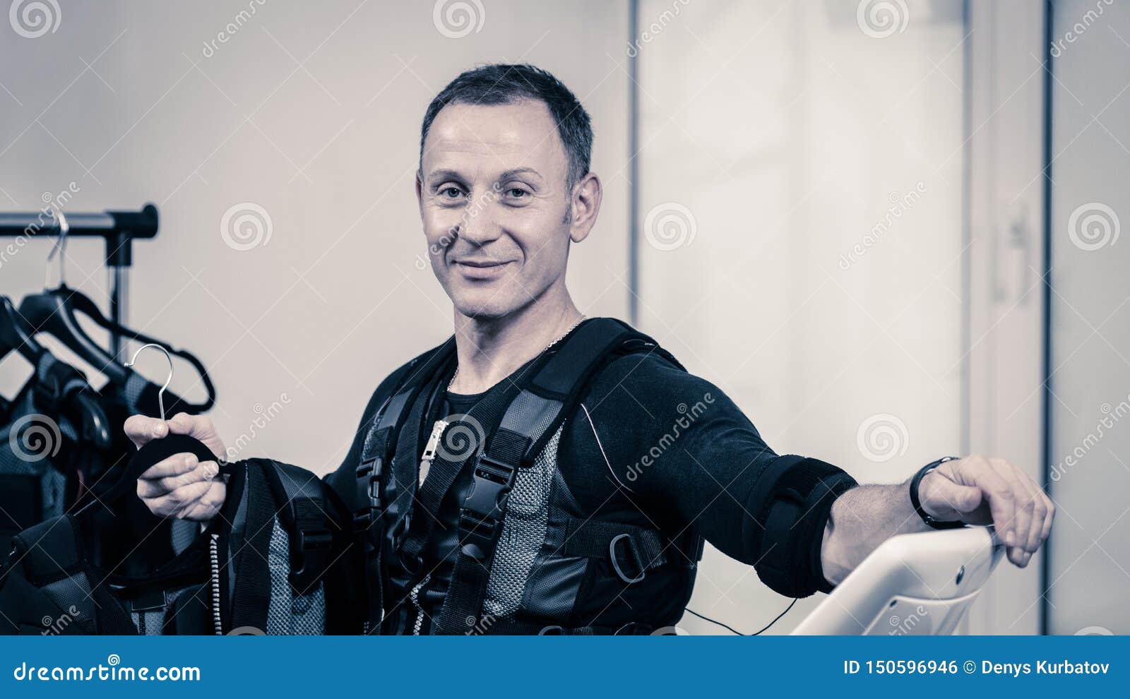 Man with EMS equipment stock photo. Image of electrostimulation - 150596946