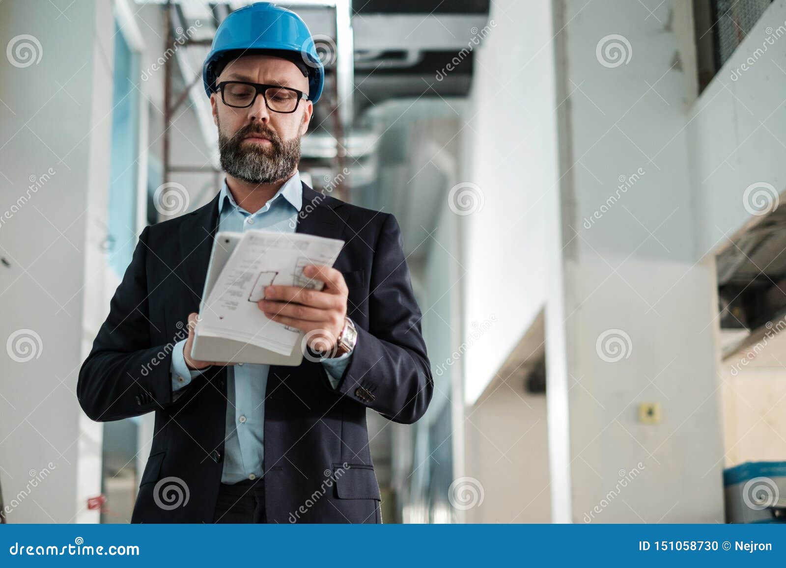 Man Engineer with a Blueprints Stock Photo - Image of engineer ...