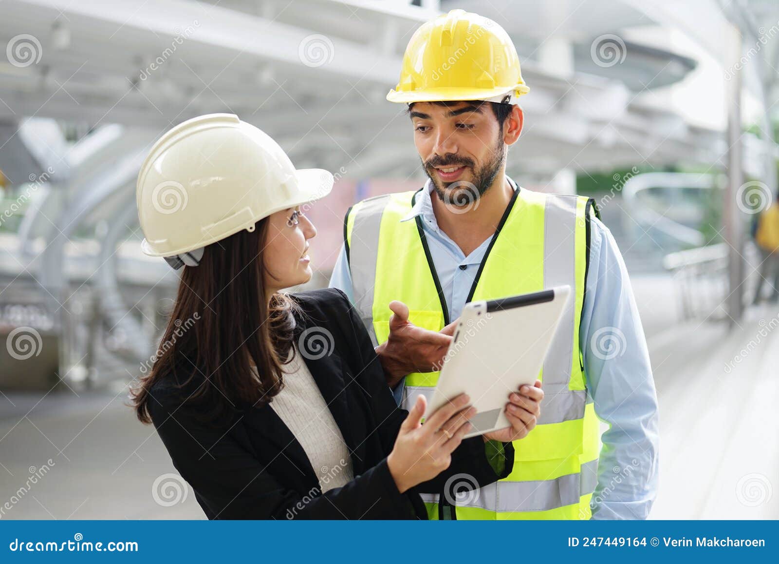 Man Engineer Discussing To Coworker about Project Engineering on ...