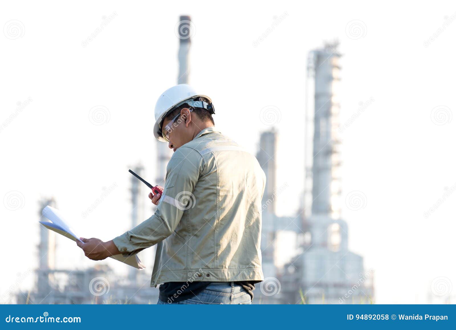 The Man Engineer Reading the Drawing Paper Construction for Plan Work ...