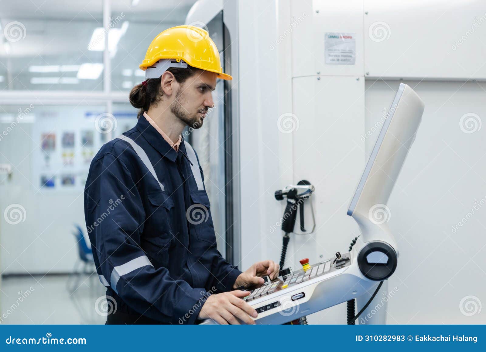 Man Engineer Using Computer Controlling Cnc Machine at Workshop ...