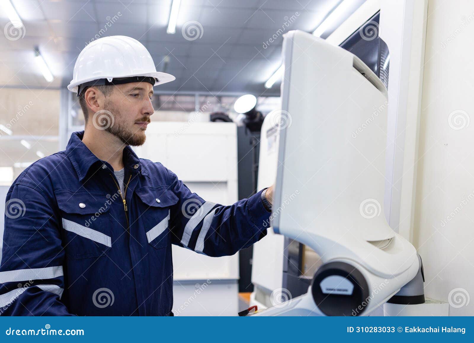 Man Engineer Using Computer Controlling Cnc Machine at Workshop ...