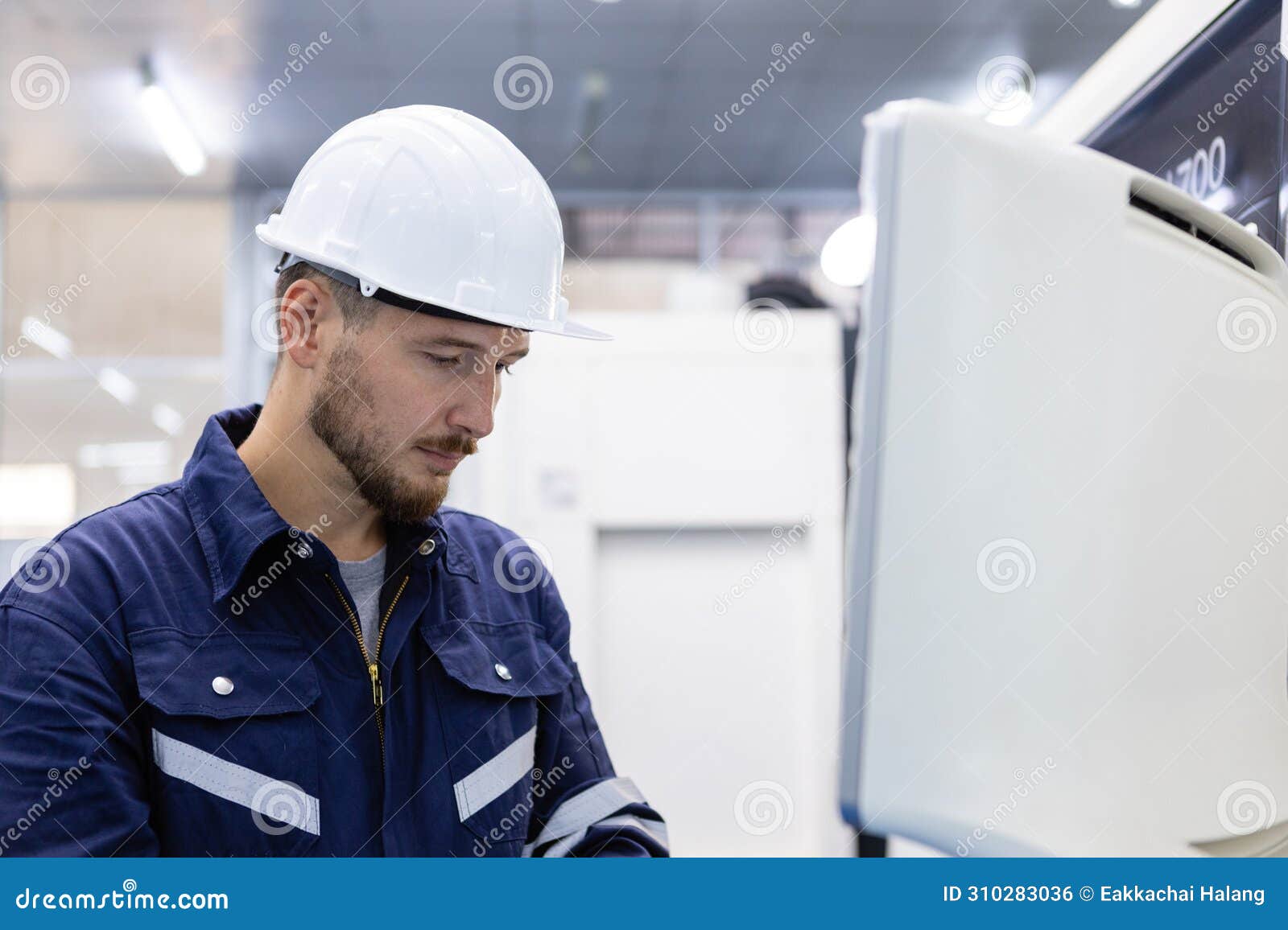Man Engineer Using Computer Controlling Cnc Machine At Workshop Professional Male Control