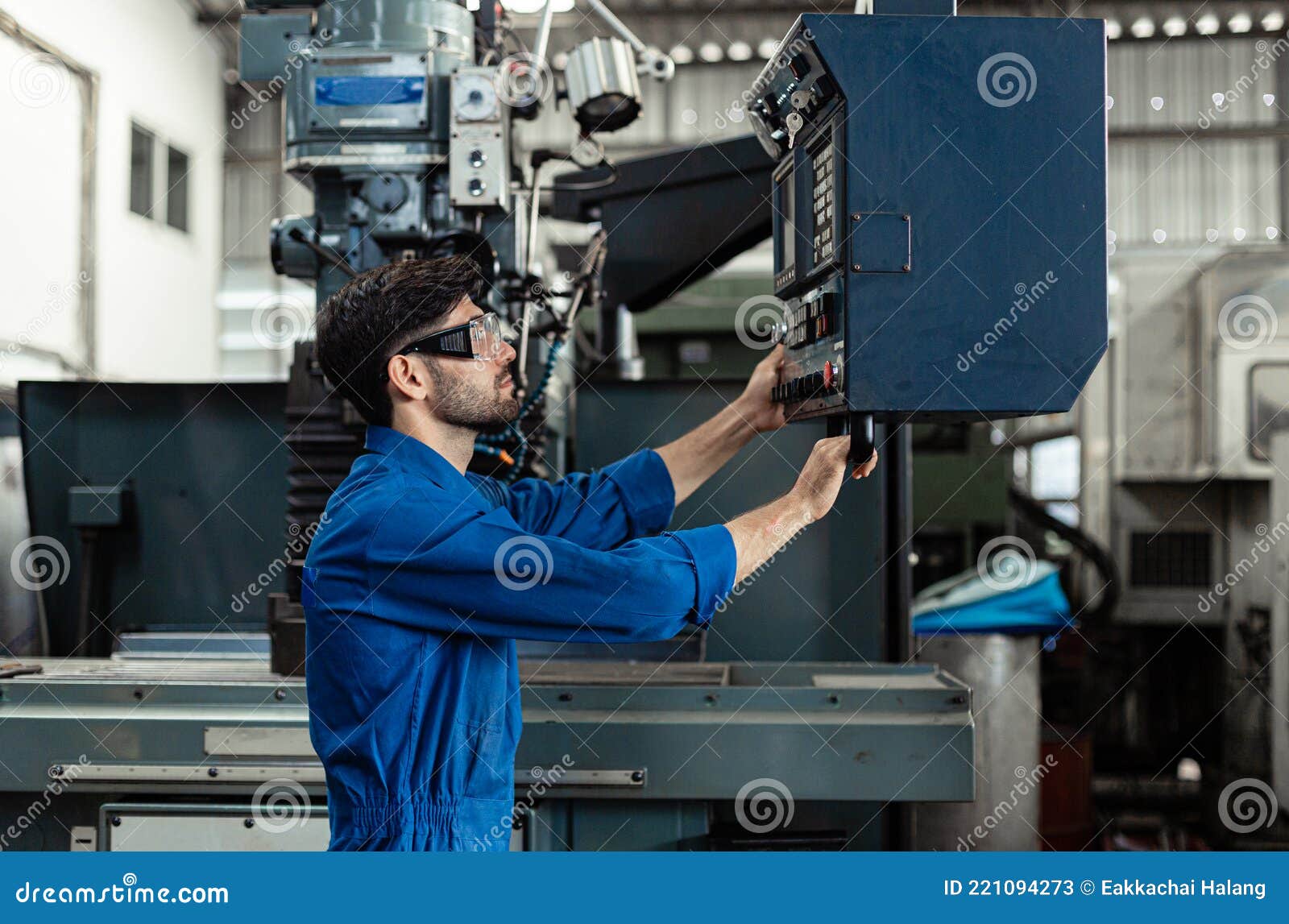 Man Engineer Wearing Uniform Safety are Checking System Machine in ...