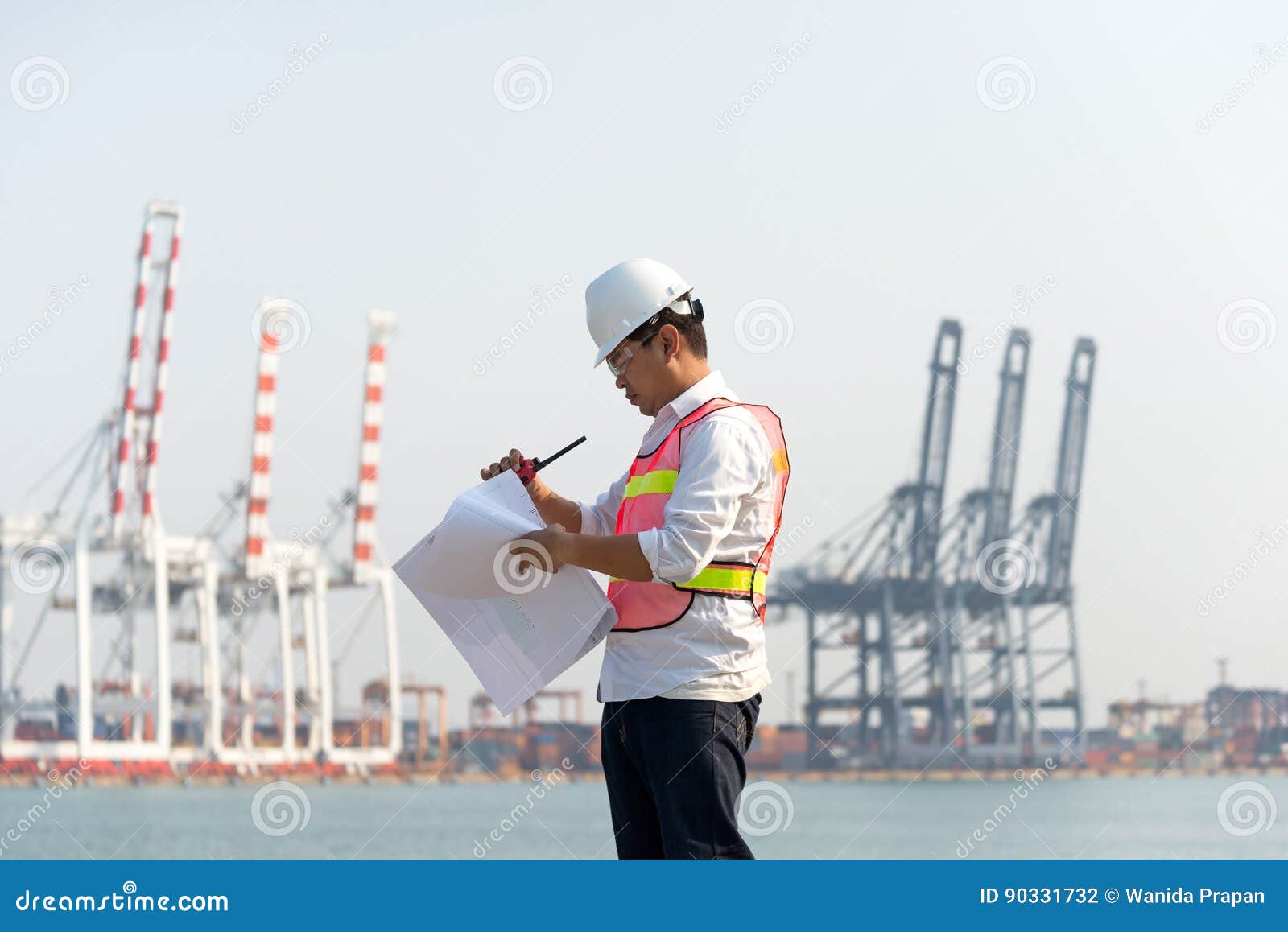 The Man Engineer Working with Container Cargo Freight Ship in Shipyard ...