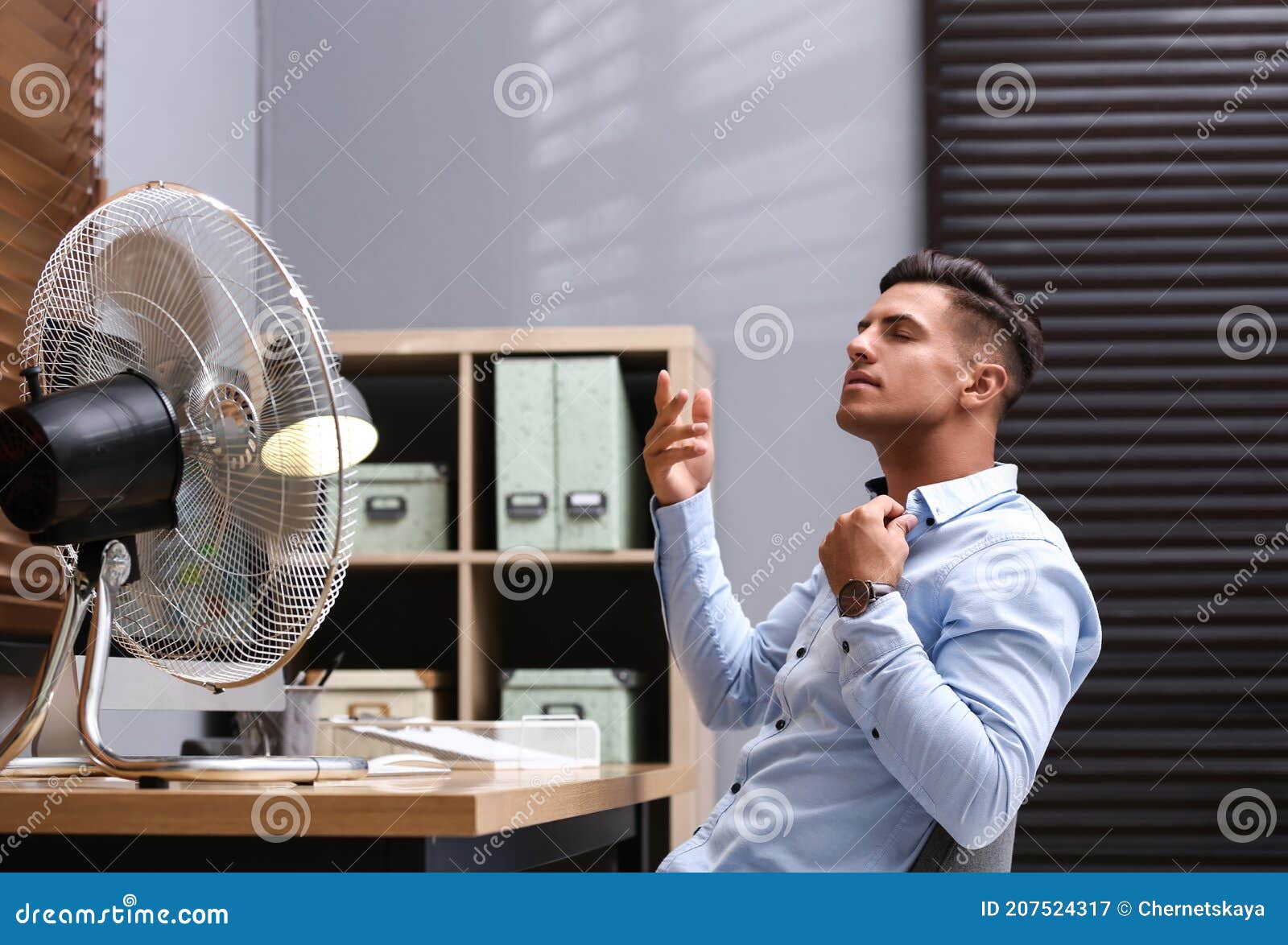 Man Enjoying Air Flow from Fan Stock Image - Image of modern, cooling ...