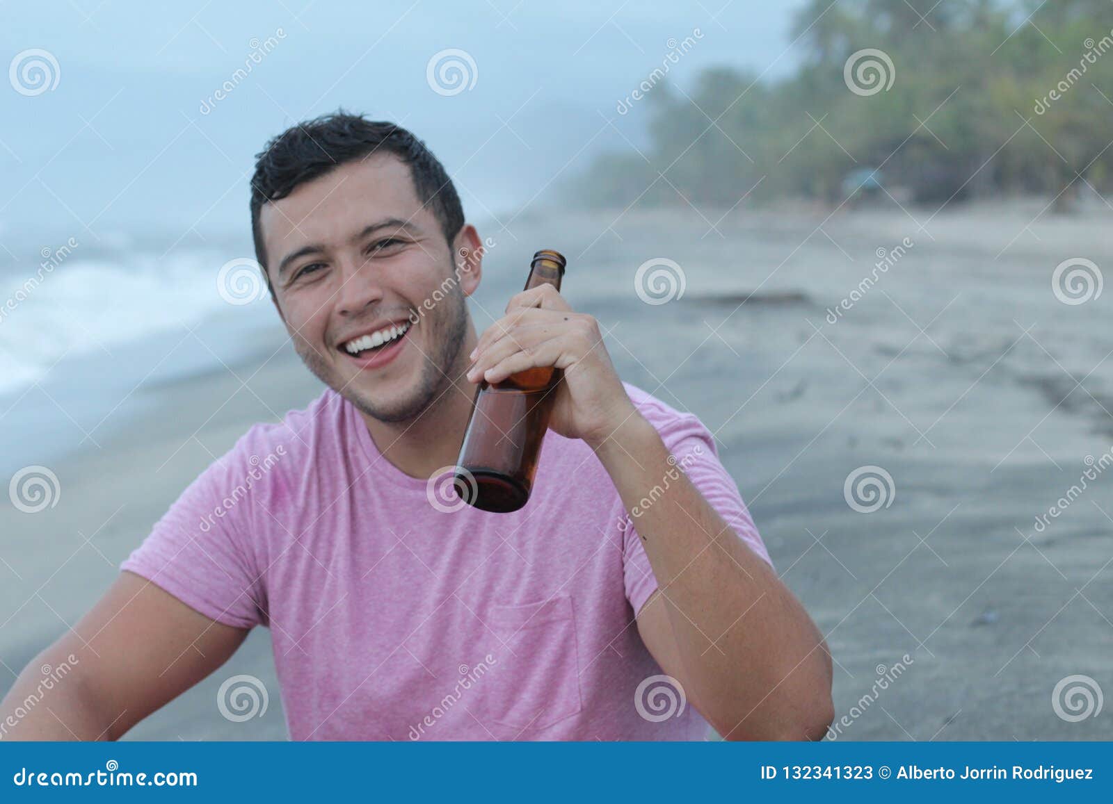 Man Enjoying a Beer at the Beach Stock Image - Image of hispanic ...