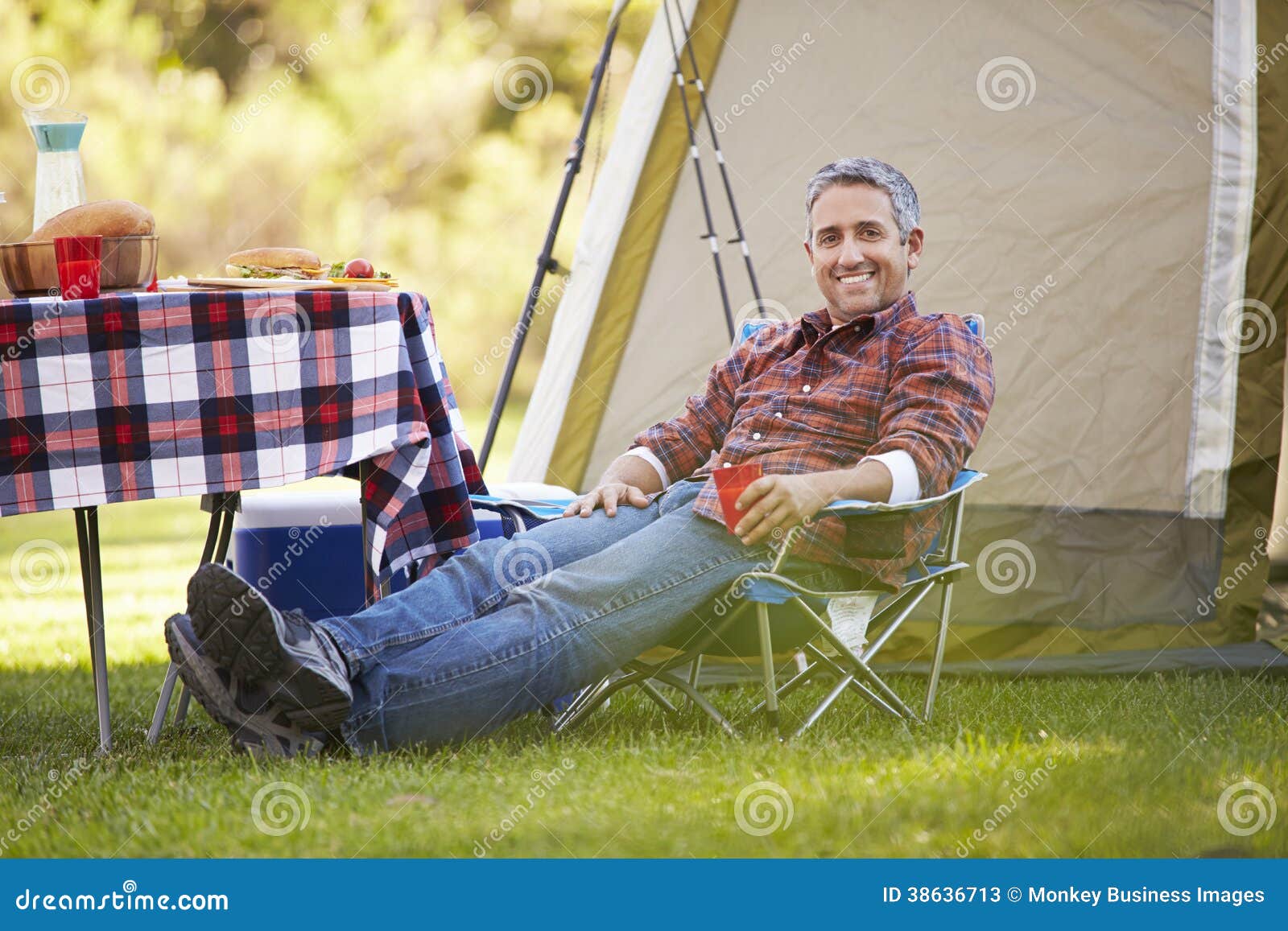 Man Enjoying Camping Holiday in Countryside Stock Image - Image of ...