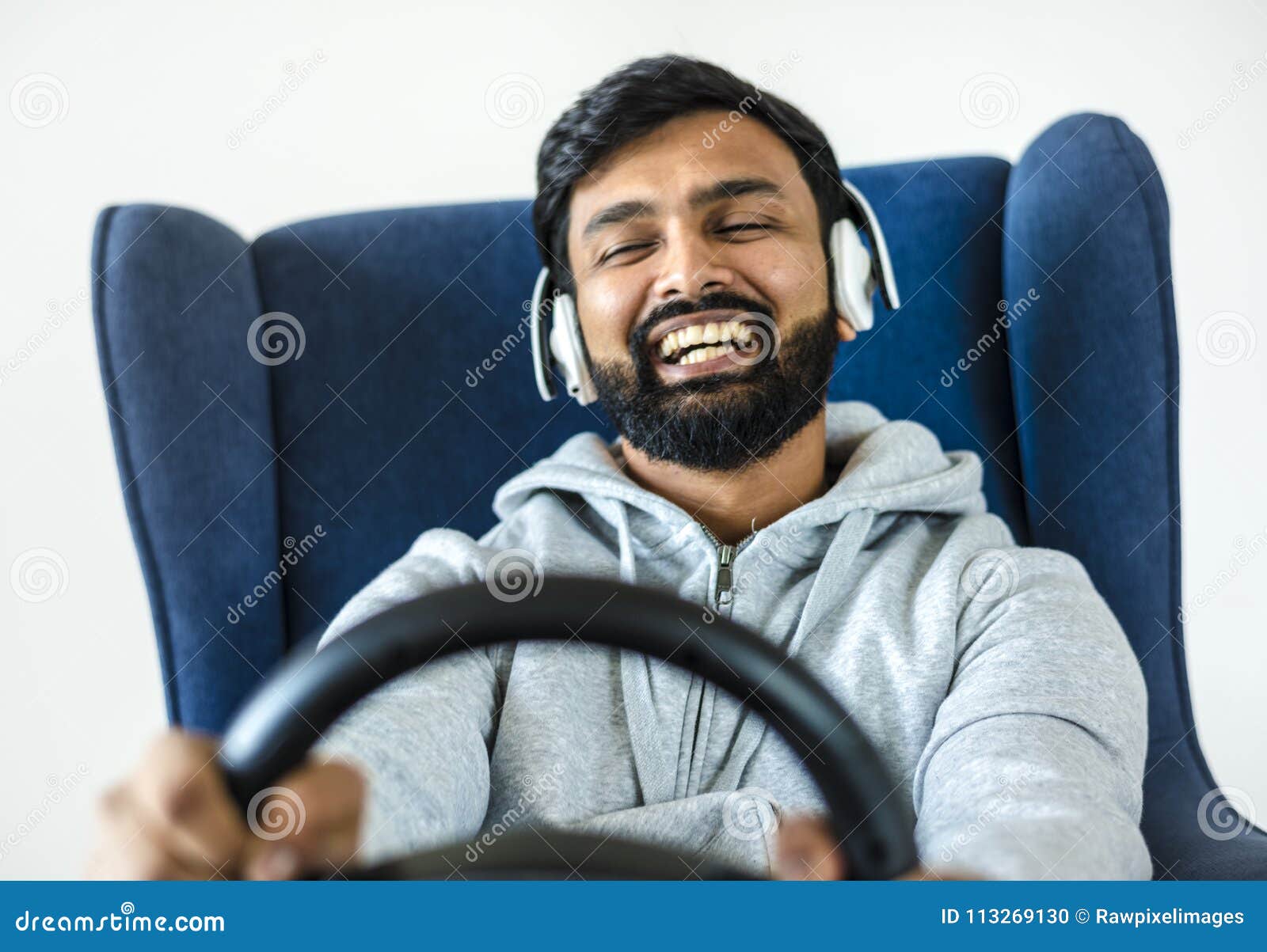 Man Enjoying Car Racing Game Stock Photo - Image of drive, laughing ...