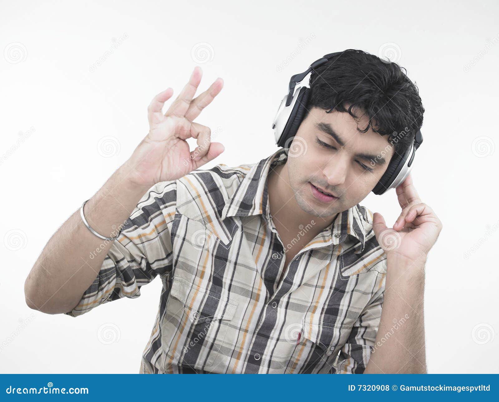 Man enjoying his to music stock photo. Image of checks - 7320908