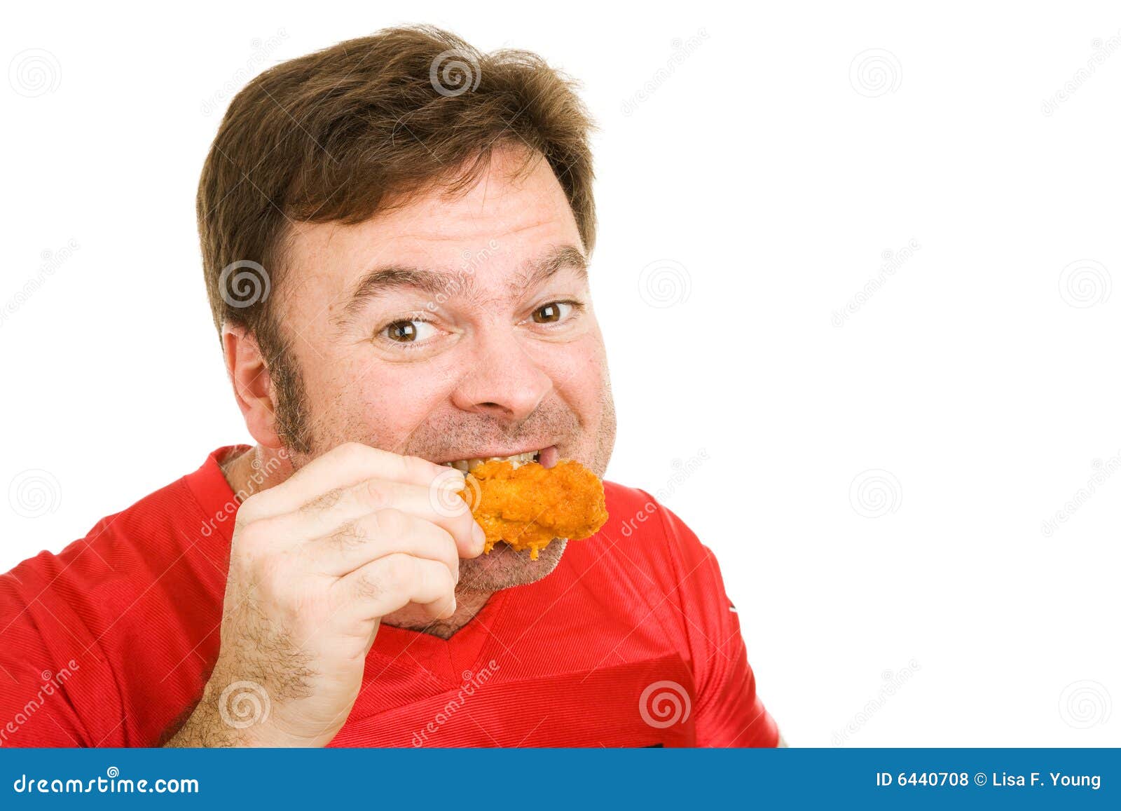 Man Enjoying Hot Wings stock photo. Image of closeup, aged - 6440708