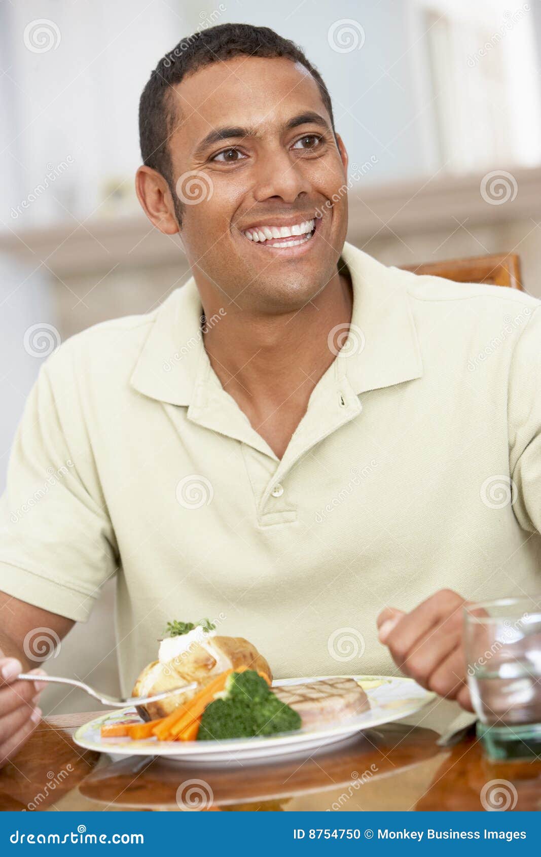 Man Enjoying a Meal at Home Stock Photo - Image of enjoying, person ...