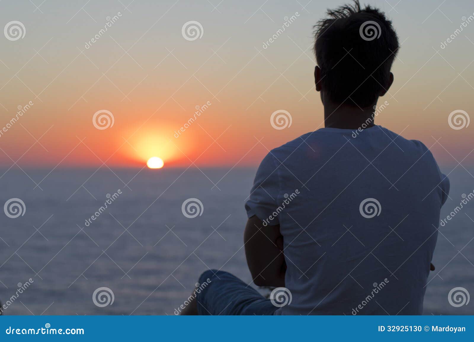 Man enjoying sunset stock photo. Image of dusk, sitting - 32925130