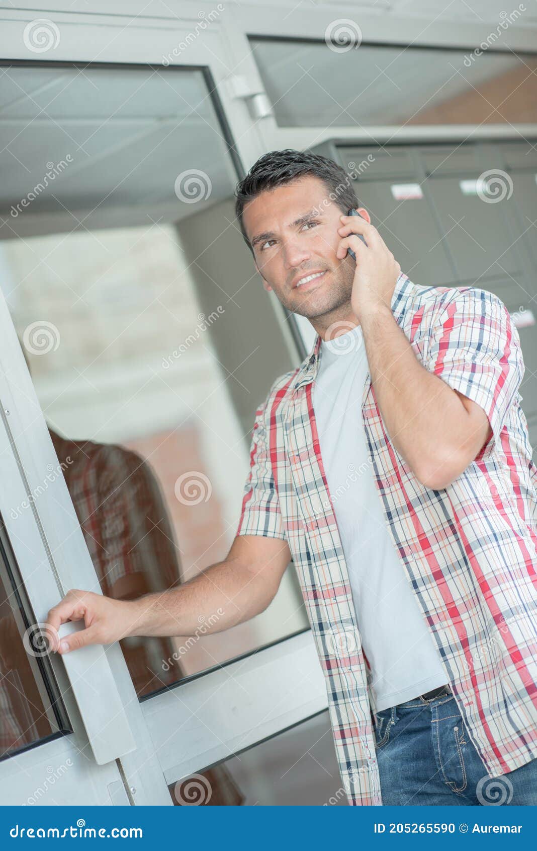 Man entering building stock photo. Image of entering - 205265590