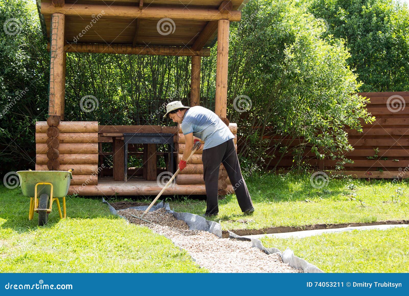 Man Evens Gravel on Path with Rake Stock Image - Image of construction ...